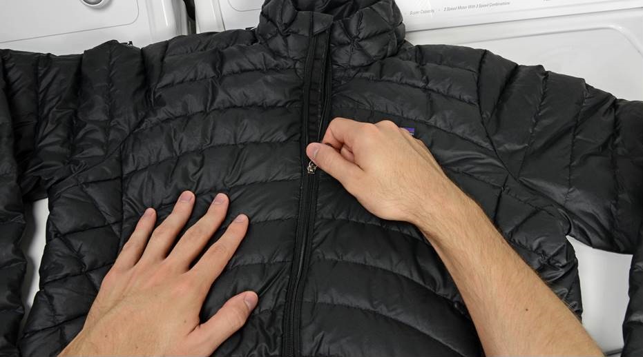 Should I turn my jacket inside out when washing it in the washing machine?