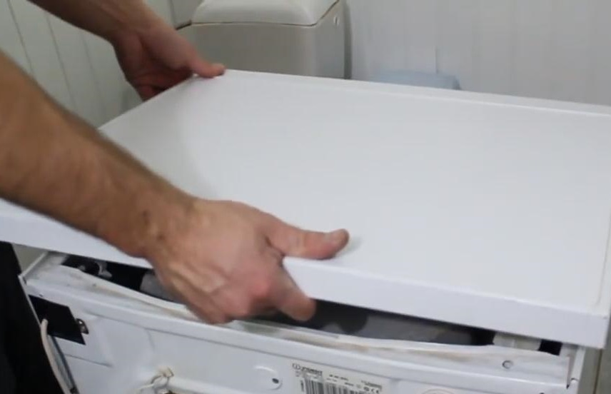 How to disassemble a washing machine tank